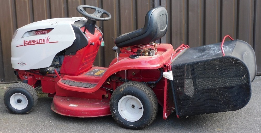 A Lawnflitee 700 Transmatic Series ride on lawn mower.
