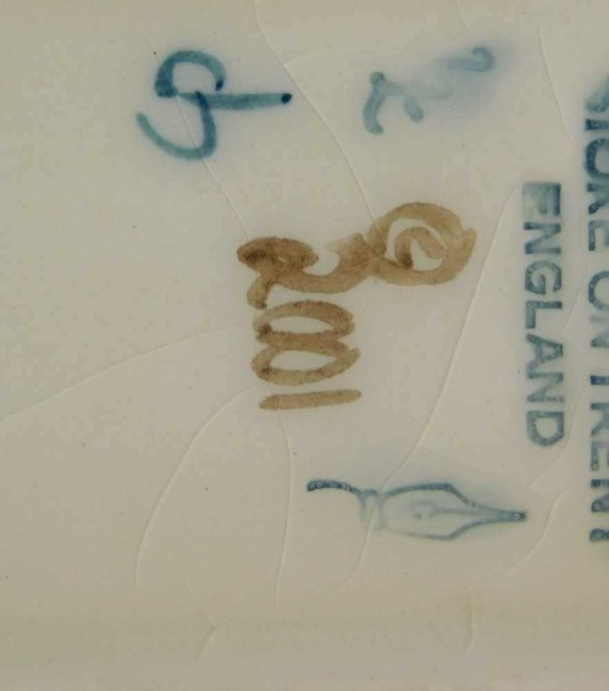 A Moorcroft pottery rectangular pin tray, decorated with flowers ...