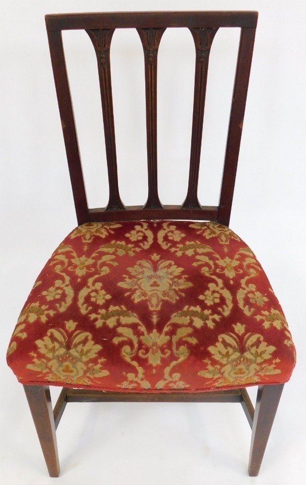 A set of four 19thC mahogany rail back dining chairs, each with a ...