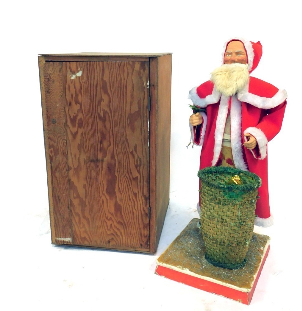 A Mid Century novelty automaton Father Christmas display figure, with ...