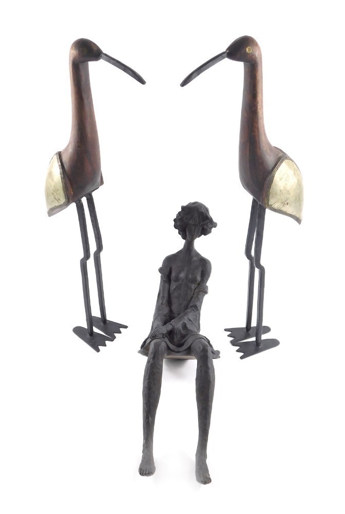 Unmarked sculptures, comprising a pair of sculptured and wooden birds ...