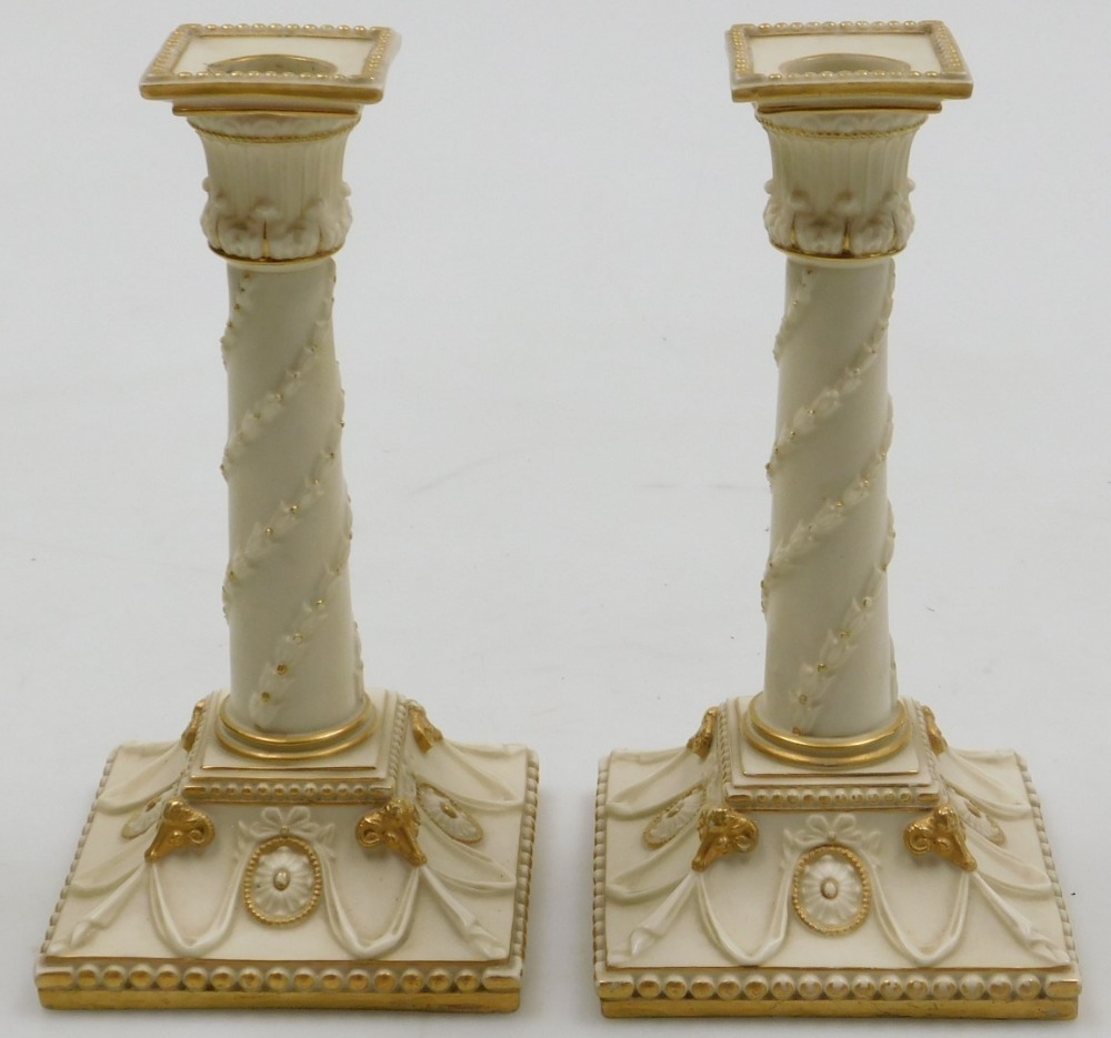 A pair of late 19thC Worcester porcelain candlesticks, converted for ...