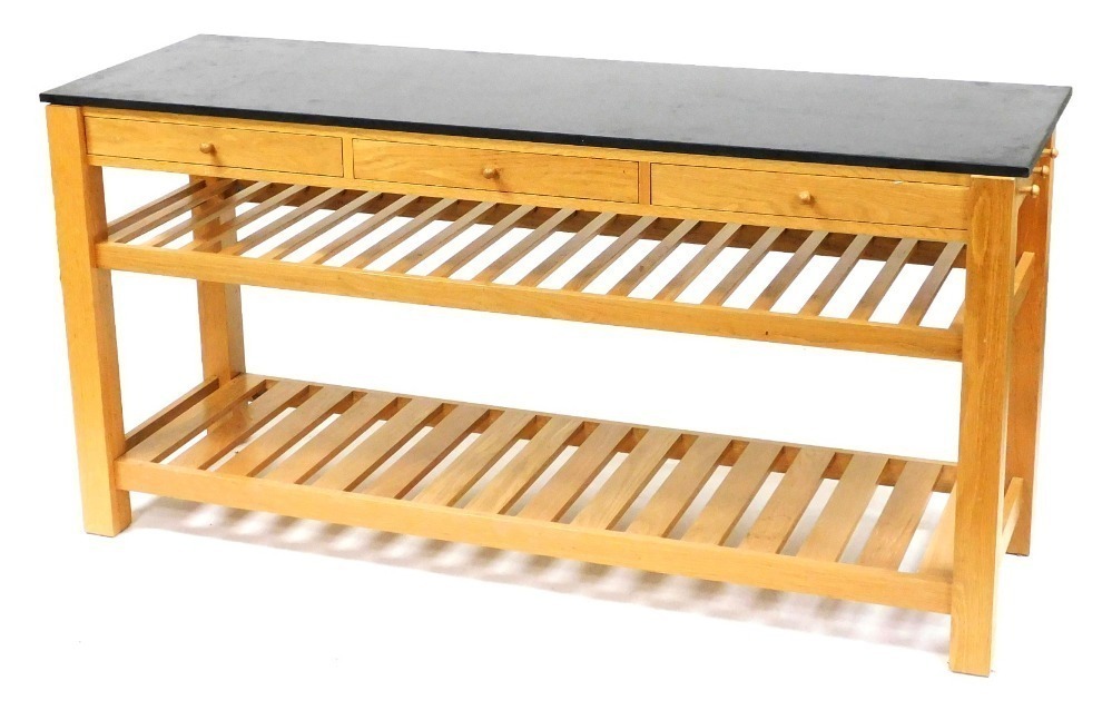 A Heels light oak and black stone topped kitchen worktable, with three ...
