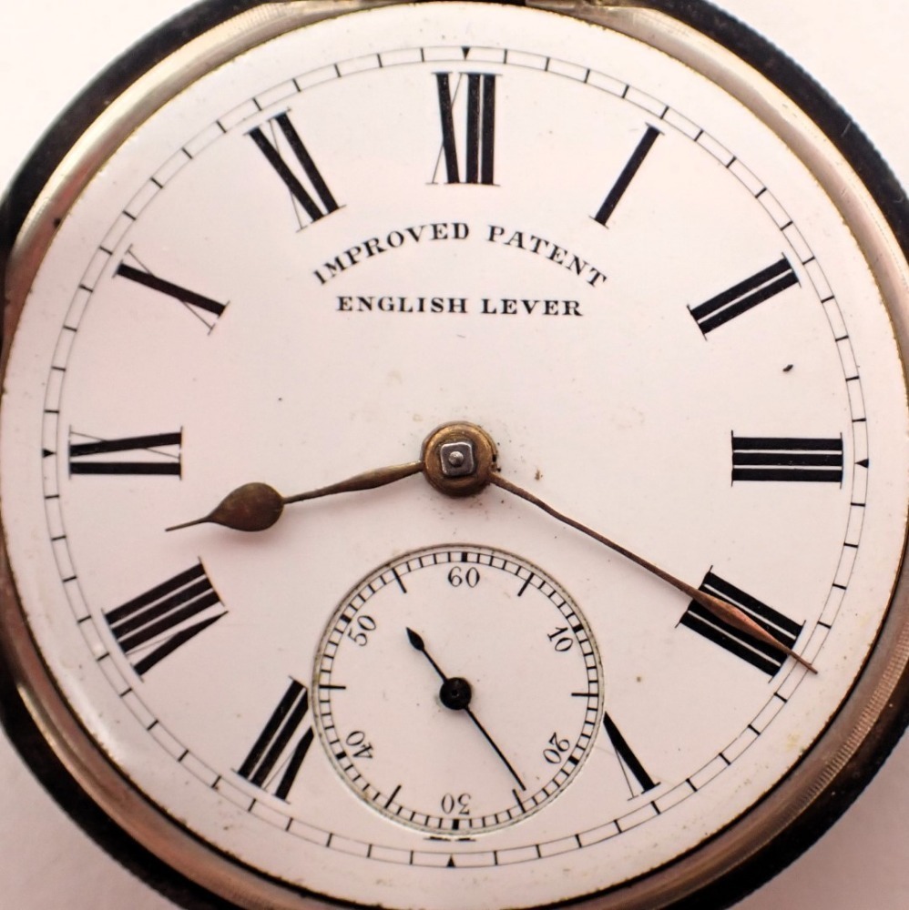 A Victorian silver cased pocket watch, with a white enamel face, with ...