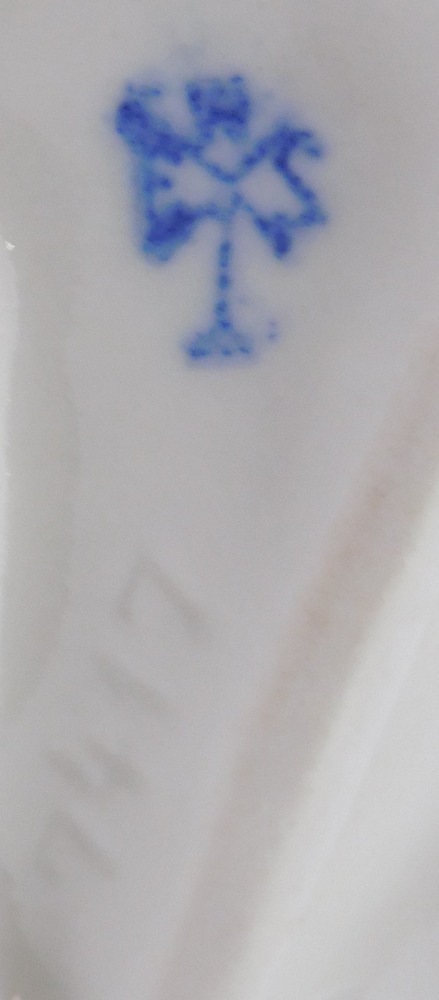 A Karl Ens porcelain figure group depicting two birds on tree branch ...