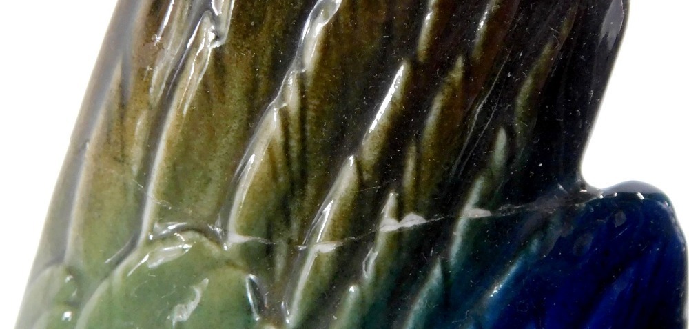 A Karl Ens porcelain figure group depicting two birds, possibly bull ...