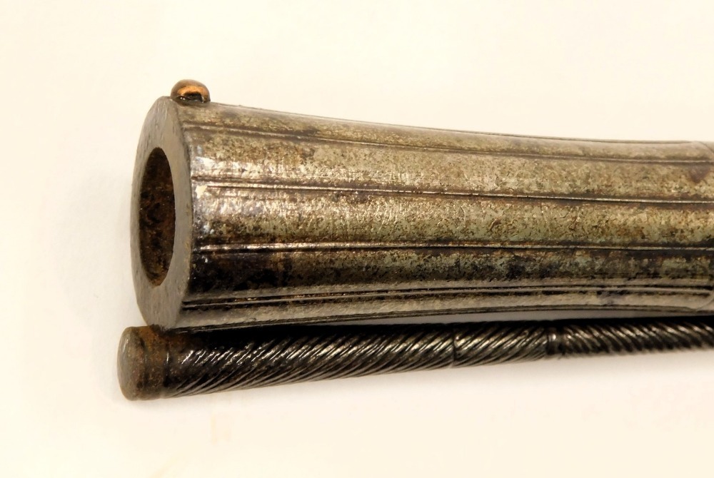 A 19thC Indian matchlock musket, with slightly flared muzzle, ram rod ...