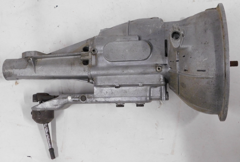 A Triumph TR3 gearbox and bell housing, No TS62A88, with additional spares.