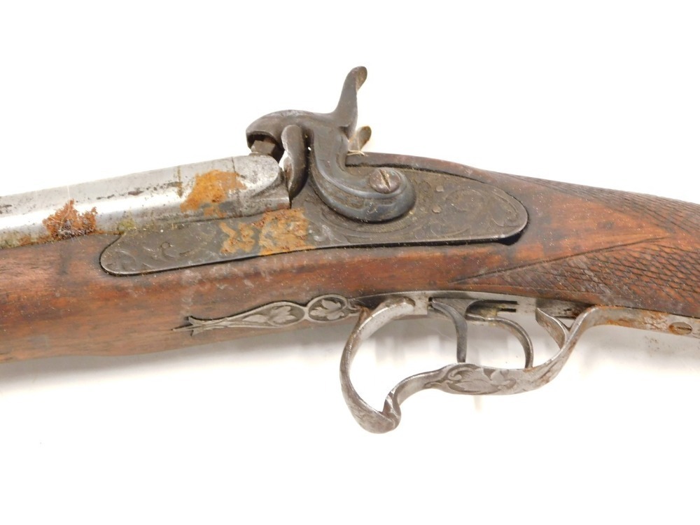 A 19thC Continental double barrel hammer action sporting gun, with ...