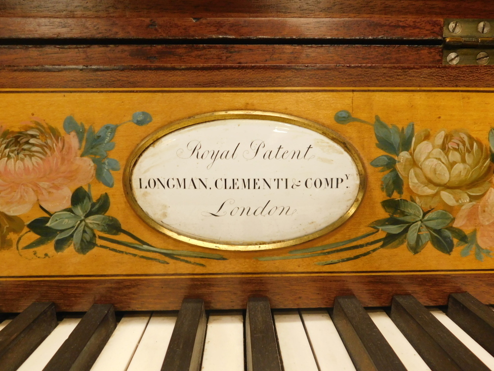 Longmans Clementi & Company, London. A mahogany and painted decorated ...