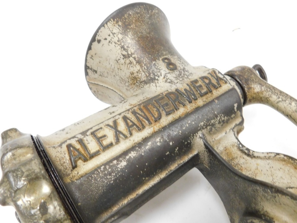 A vintage Alexanderwerk model 8 meat mincer, with attachments.