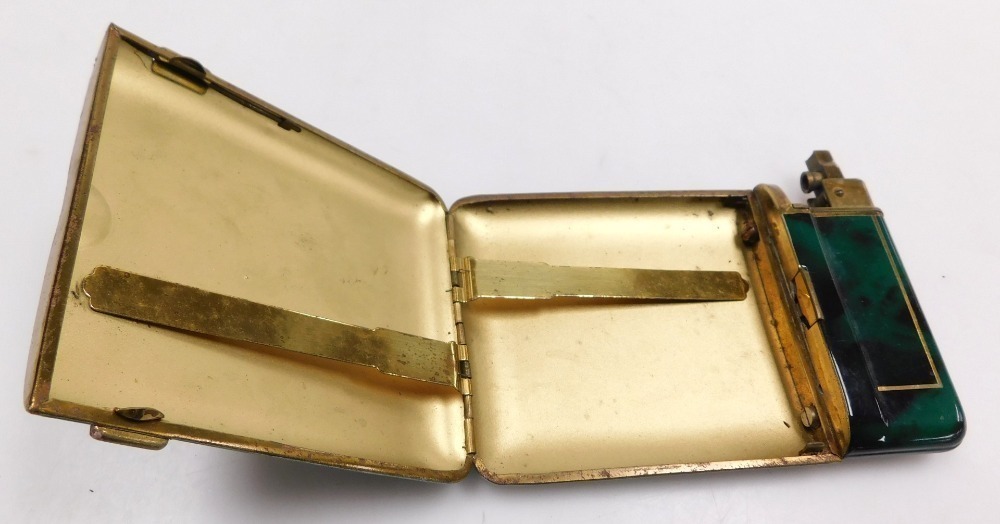 A post WW2 cigarette case and lighter, with a faux green marble casing ...
