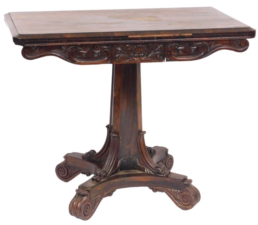 A Regency Irish rosewood card table, with swivel moulded fold over top ...
