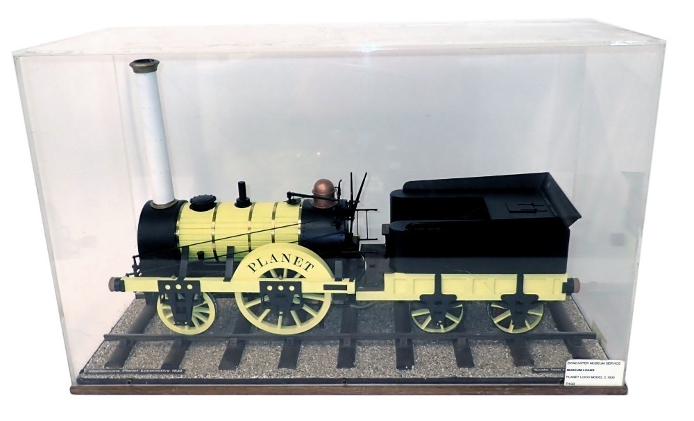 A scale model of Stephenson's Planet locomotive circa 1830, in black ...