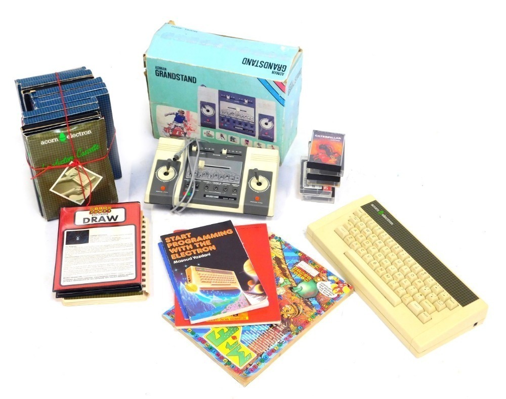 A group of Acorn Soft cassettes, Acorn computer procedure manual, an ...