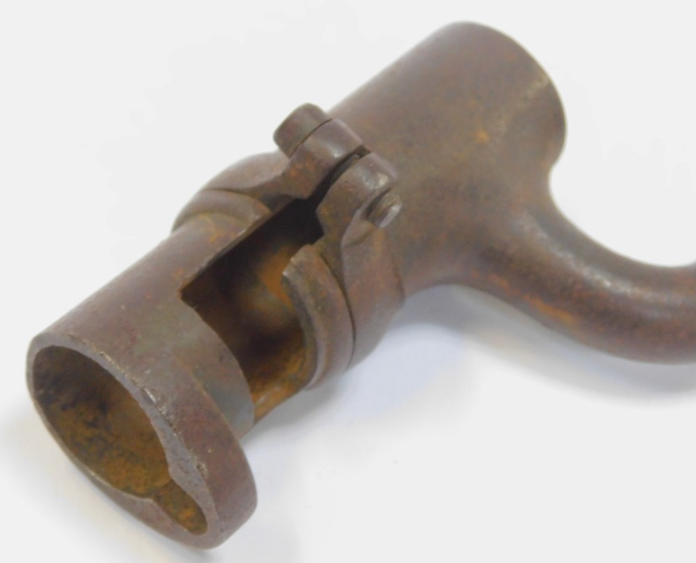 A British Enfield socket bayonet, with triangular blade marked WD, with ...