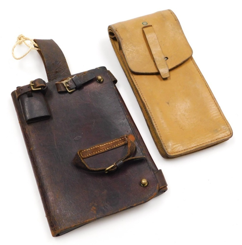 A WWI German leather map case, and another, the German cased stamped ...