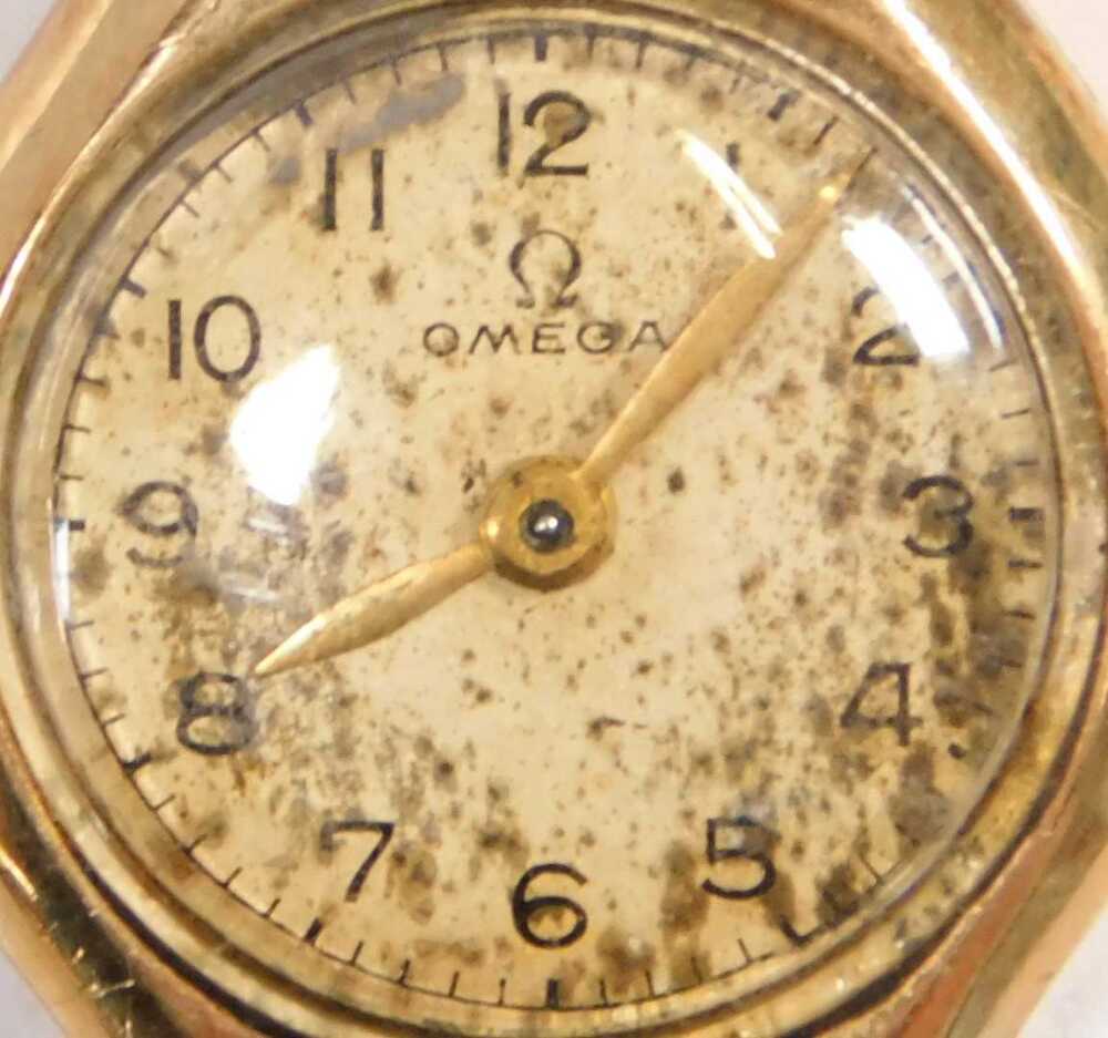 An Omega 9ct gold cased lady's wristwatch, the circular watch head on a ...
