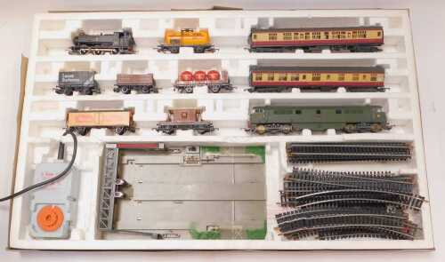 A Lima OO gauge train set, with overhead gantry signal with level ...