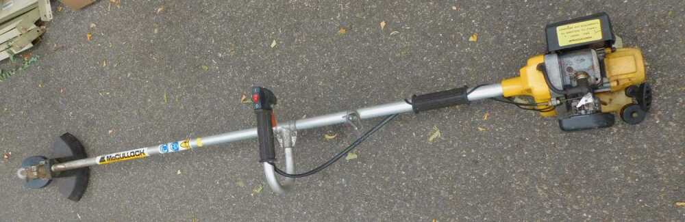 A Super Mac 26 McCulloch petrol strimmer
