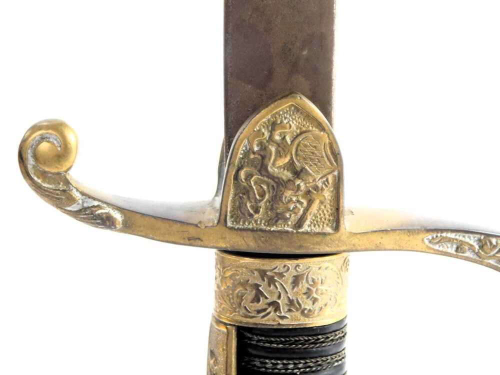 A pair of World War One German sword hilt candle holders, the column ...