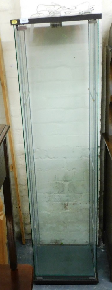 A glazed shop/retail display unit, with internal glazed shelves and ...