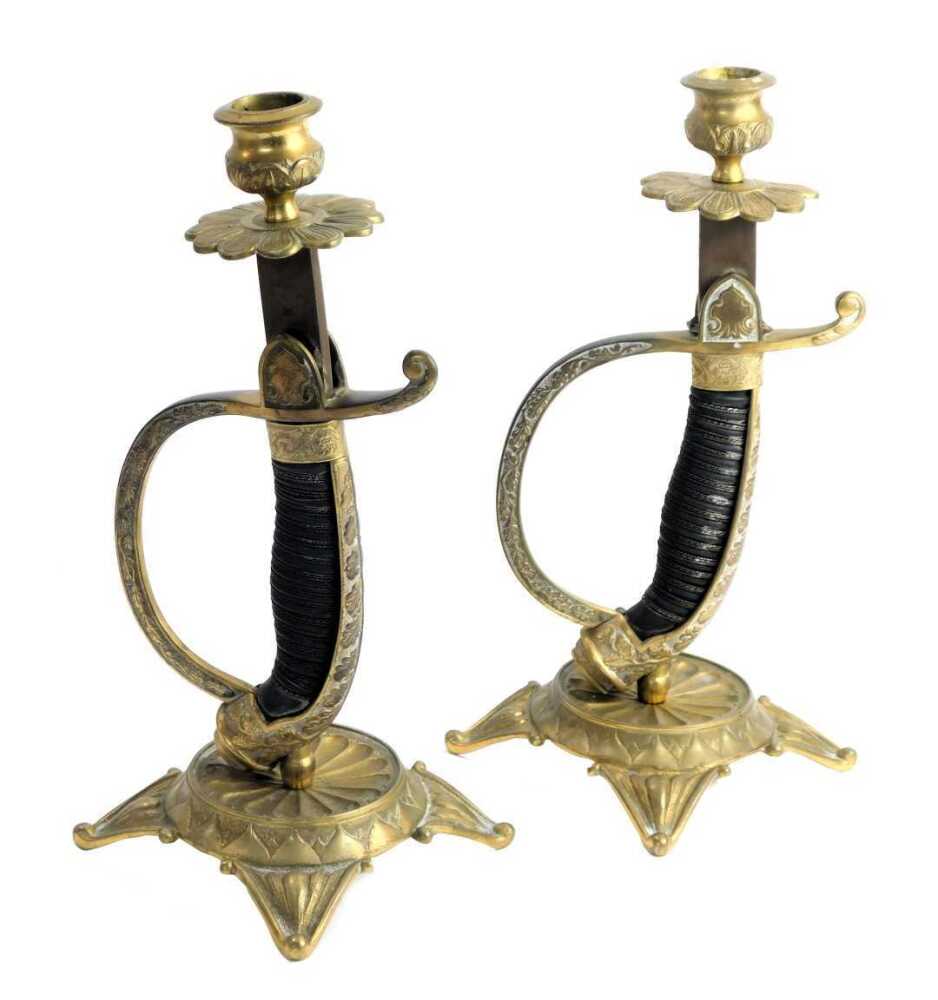 A pair of World War One German sword hilt candle holders, the column ...