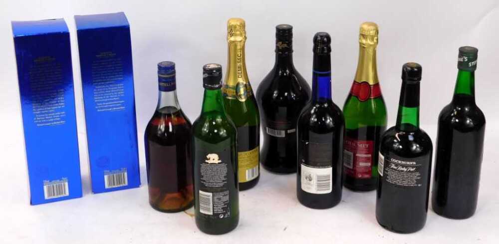 A group of alcohol, comprising three bottles of Harvey's Bristol Cream ...