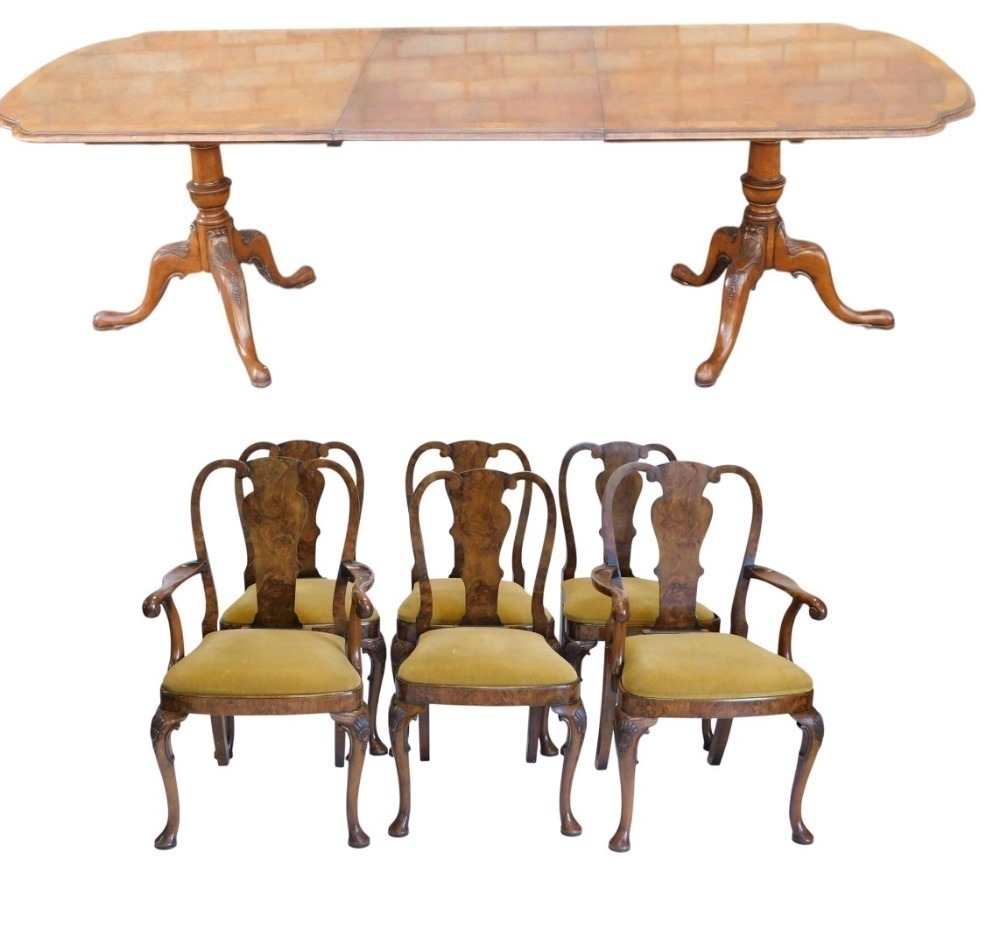 A Titchmarsh and Goodwin figured walnut extending dining table, the ...