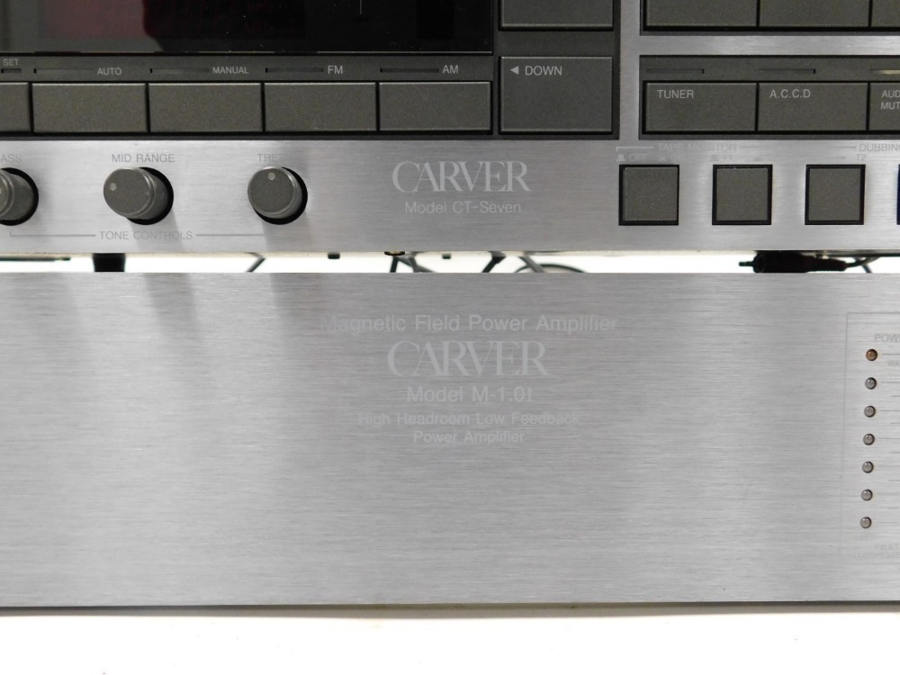 A Carver model CT-seven tuner amplifier, a model M-1.0t magnetic field ...