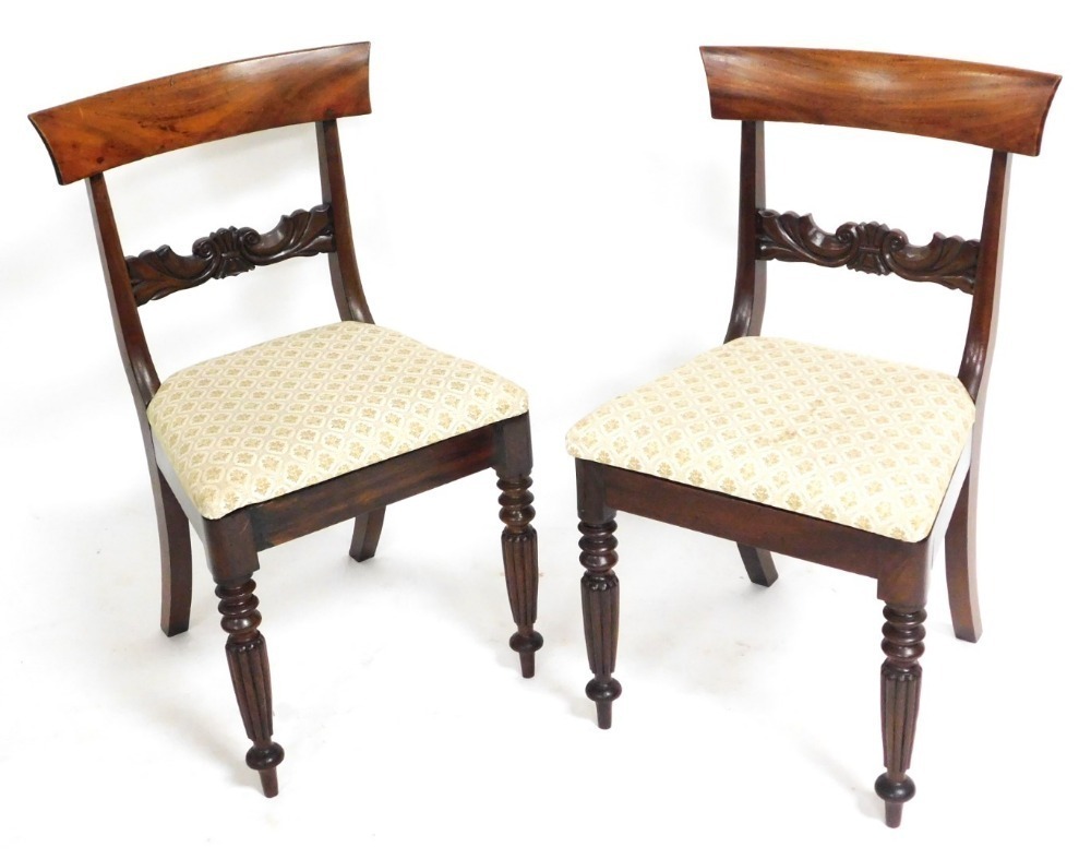 A harlequin set of nine Regency mahogany dining chairs, with cream and ...