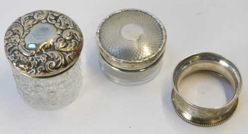 Two George V silver topped and cut glass dressing table jars, and a ...