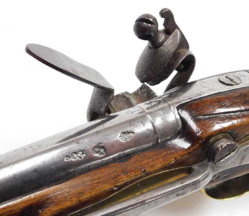 A Georgian flint lock Sea Service long pistol, with a crowned GR tower ...