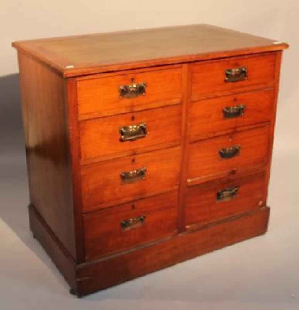 A late Victorian chest of eight drawers