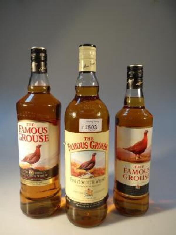 Three bottles of The Famous Grouse Blended Scotch Whisky