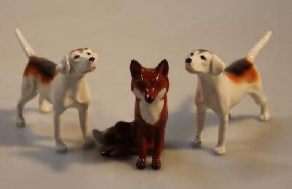 Two Beswick standing hounds