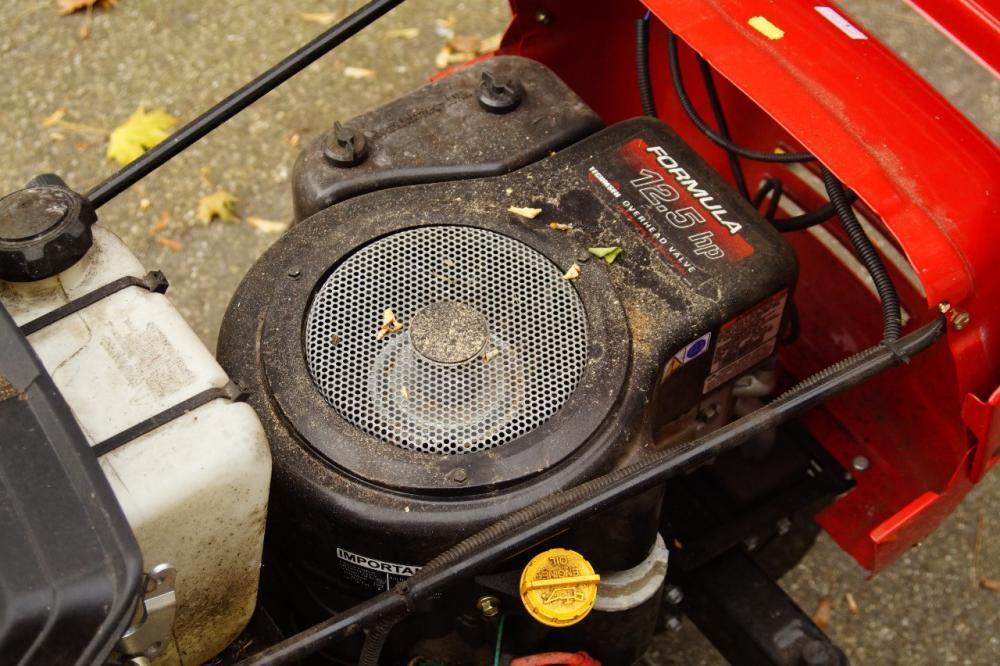 An MTD 12.5 horse power ride on mower