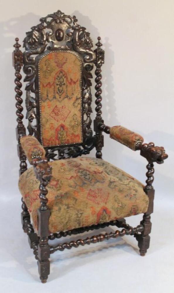 A Black Forest oak Carolean style armchair