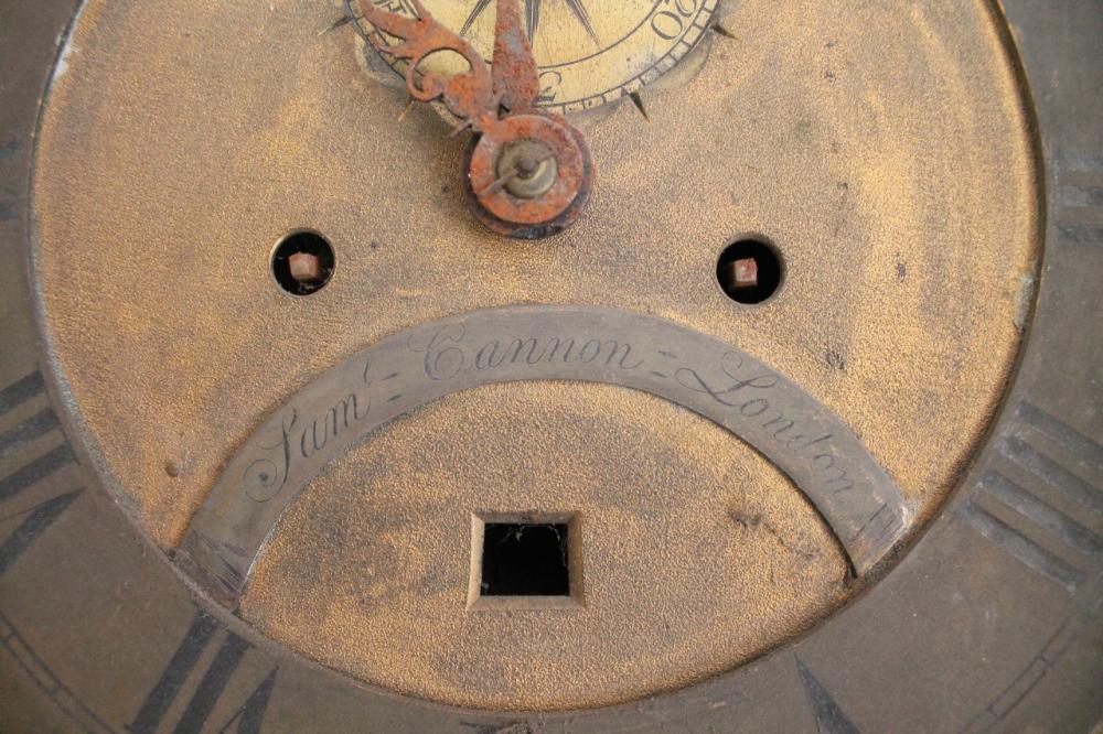 A brass faced longcase clock