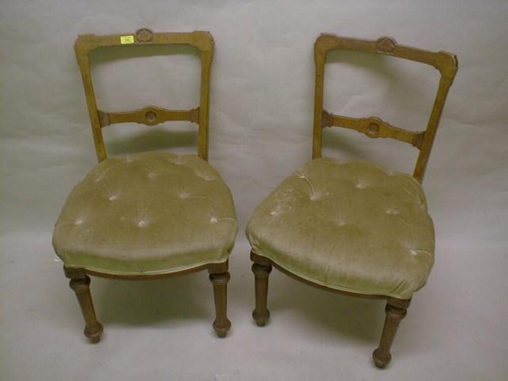 A pair of late Victorian oak barback dining chairs with overstuffed ...