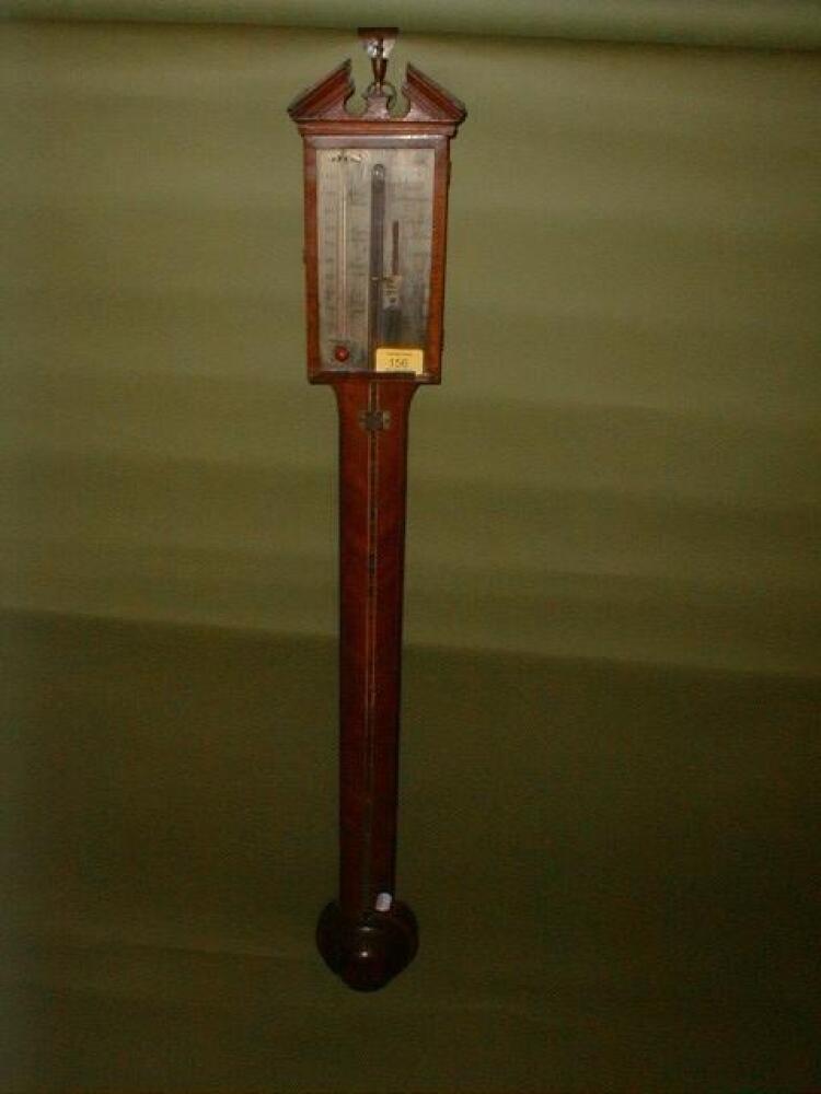 A 19thC mahogany stick barometer with broken arch pediment
