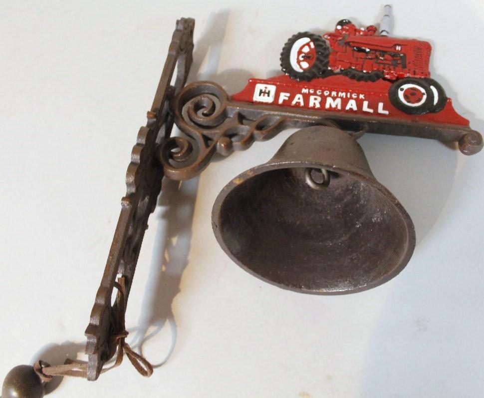 A modern Mccormick Farmall advertising tractor bell