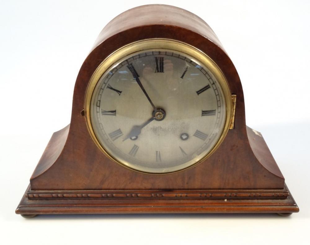A mid-20thC walnut cased Napoleon hat mantel clock