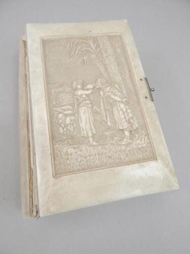 A 19thC carved ivory book cover