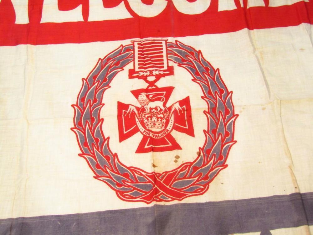 An early 20thC WWI Welcome Home Victoria Cross cloth flag