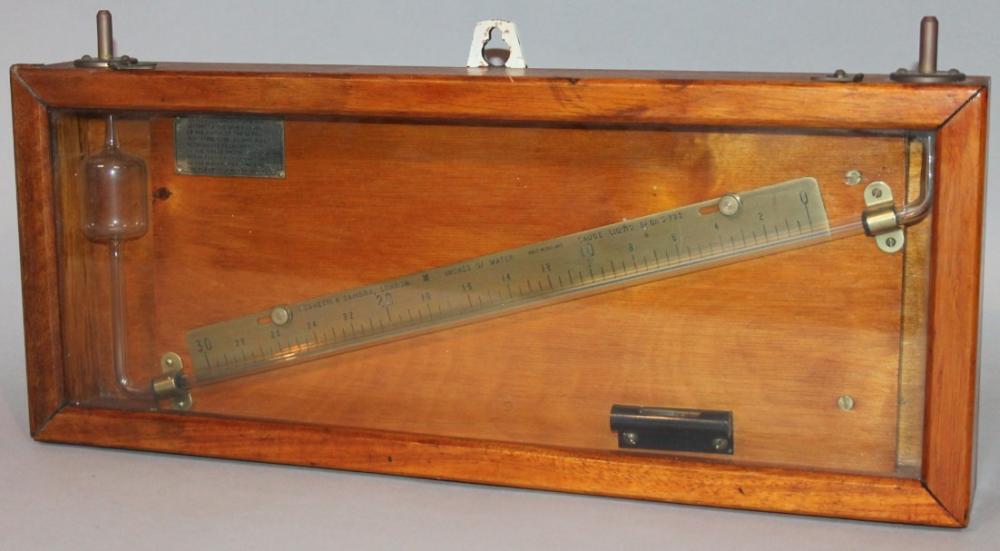 A cased Negretti & Zambra London spirit level