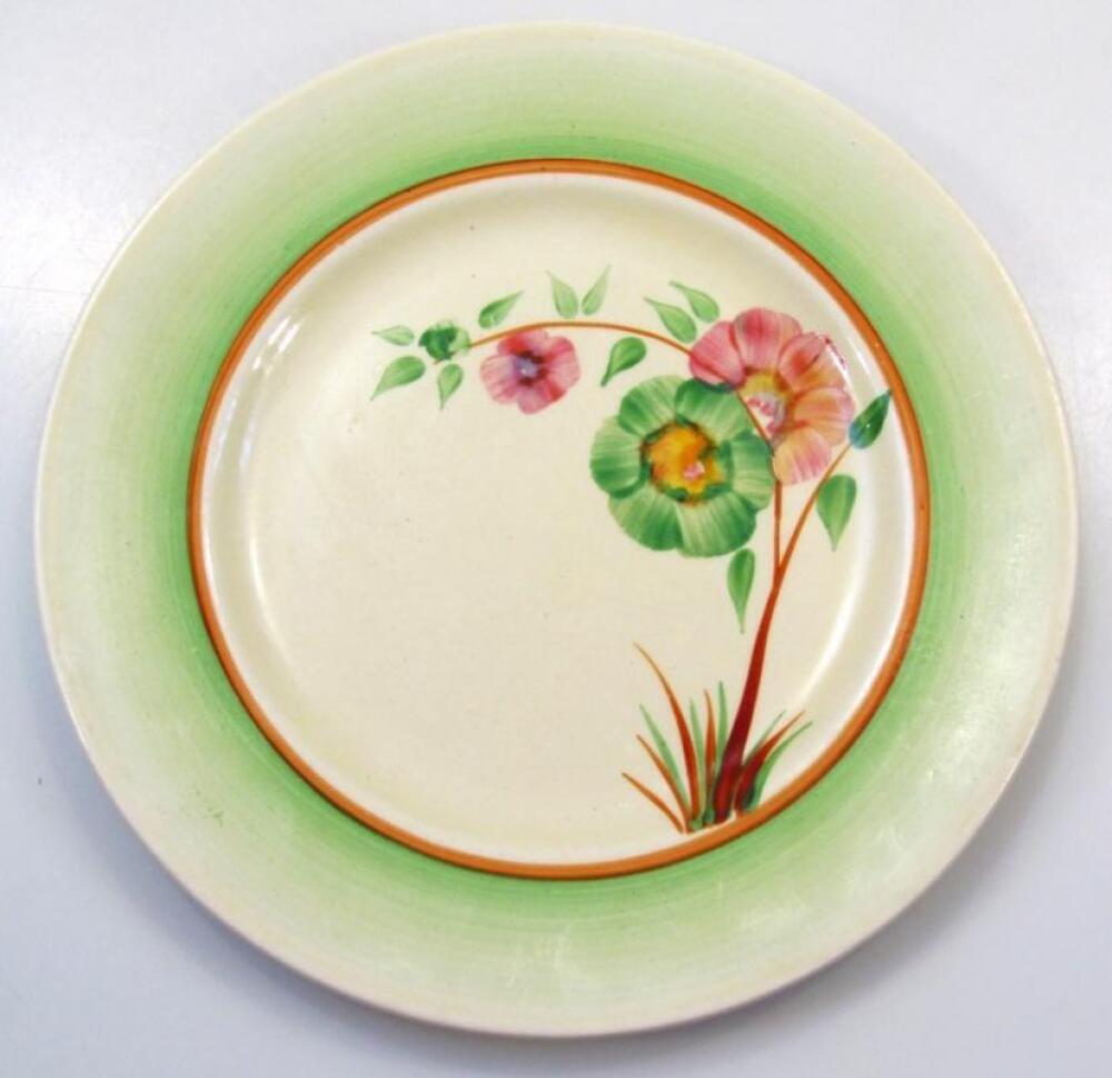 A Clarice Cliff Newport pottery Art Deco Corolla pattern part service