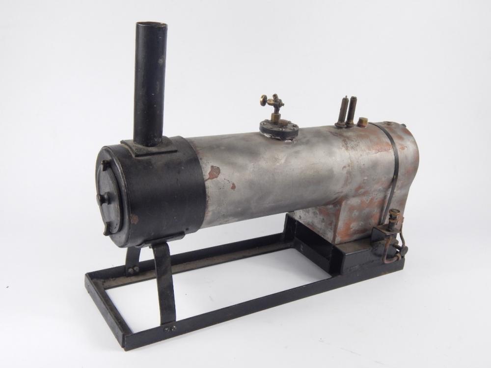 A 20thC scratch built table top engine formed as a train cylinder front
