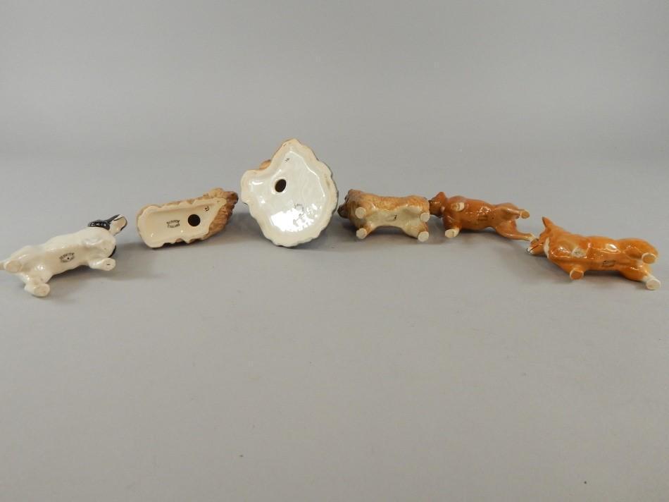 A collection of Beswick dogs