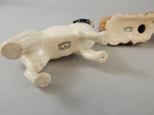 A collection of Beswick dogs